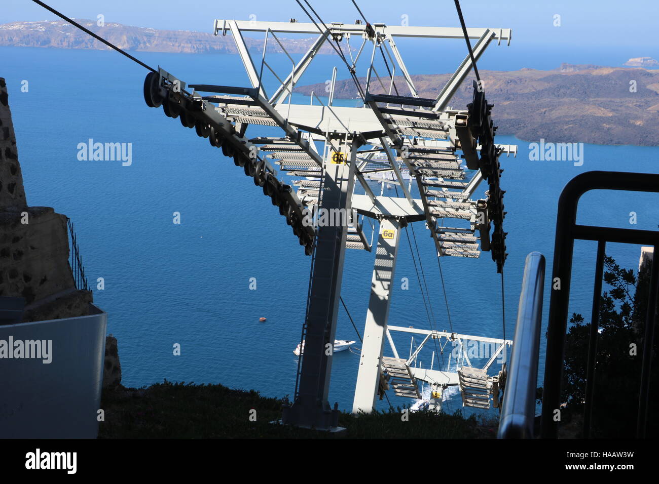 Picture of the cable car structure against the brilliant blue sea ...