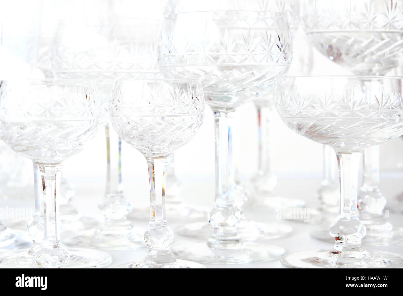 beautiful crystal glasses on white background Stock Photo - Alamy