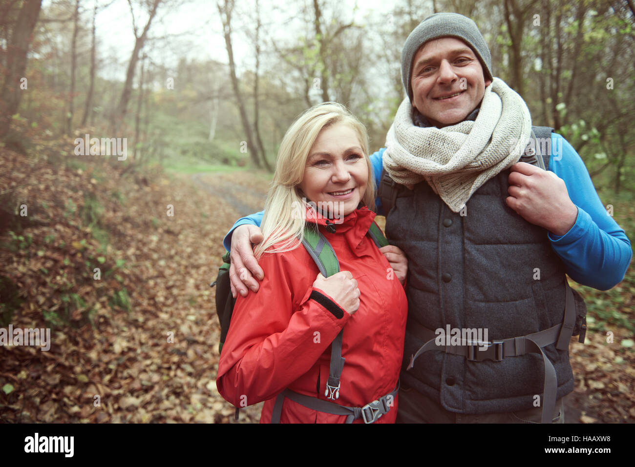 Cheerful couple in love embracement Stock Photo - Alamy