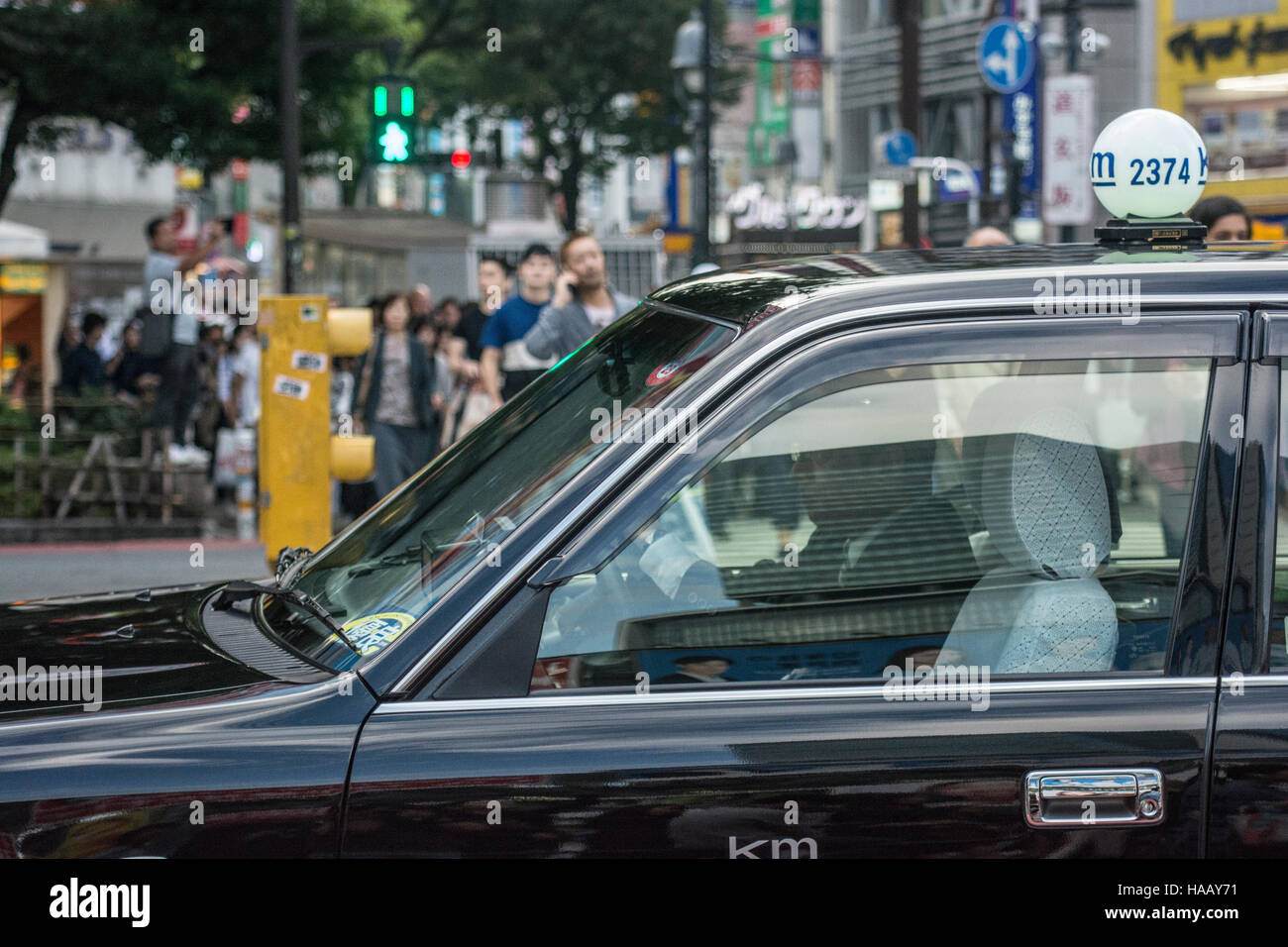 Taxi driver in Shibuya, Tokyo Stock Photo - Alamy
