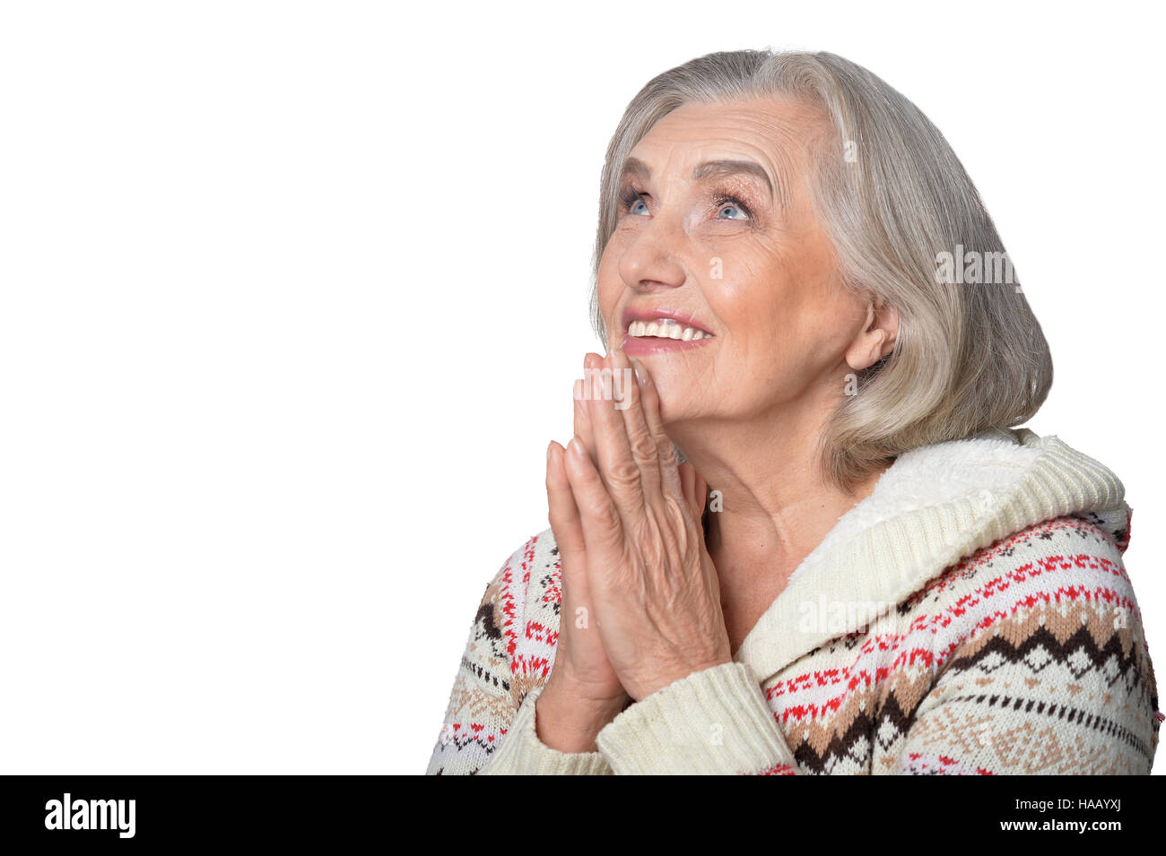 Praying senior woman Stock Photo - Alamy