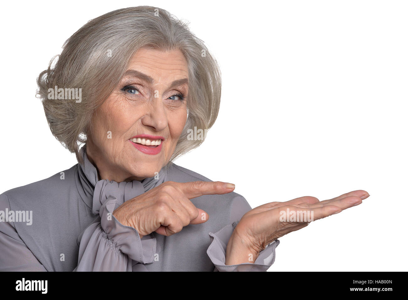 Senior woman pointing Stock Photo - Alamy