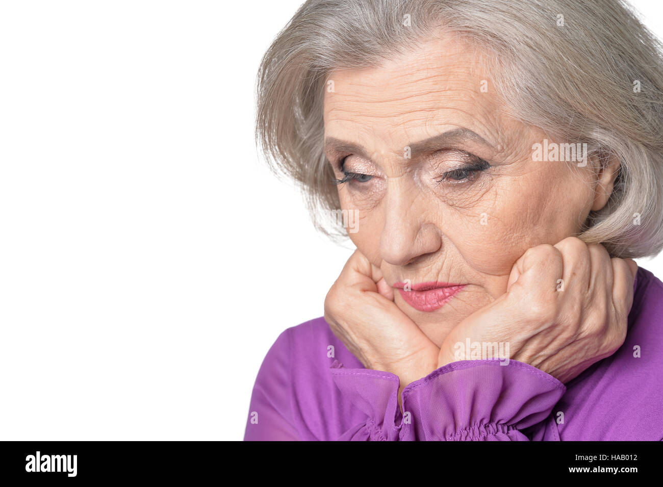 Sad senior woman Stock Photo - Alamy