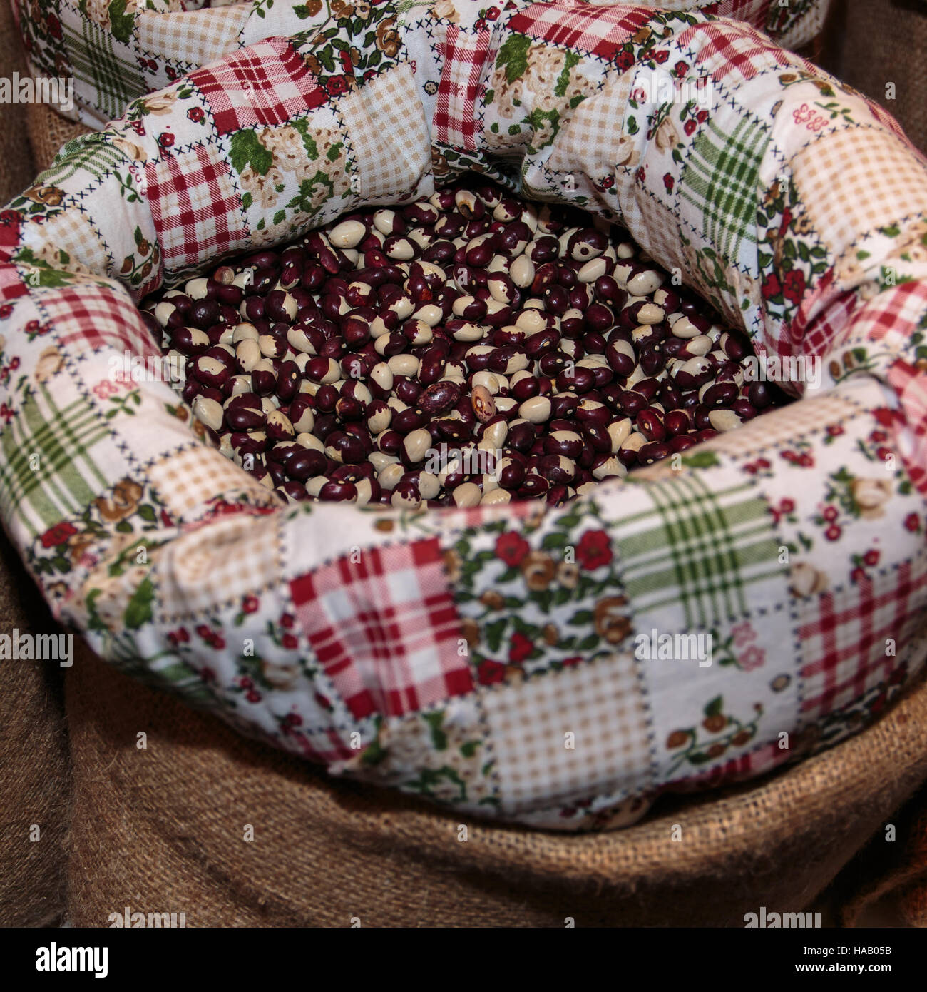 Red Calypso Beans inside Jute Sack for Sale at Market Stock Photo - Alamy