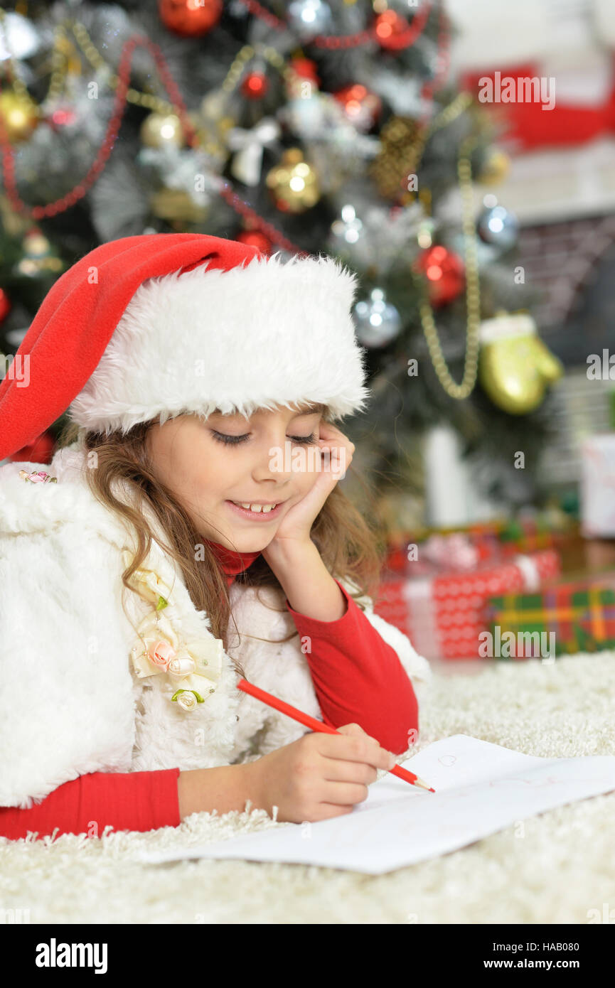 Little girl writing letter Stock Photo - Alamy