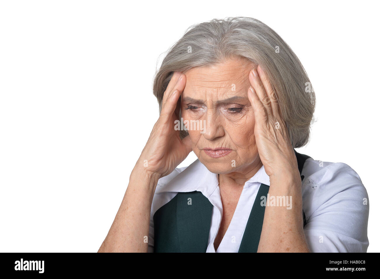 Senior woman has headache Stock Photo - Alamy