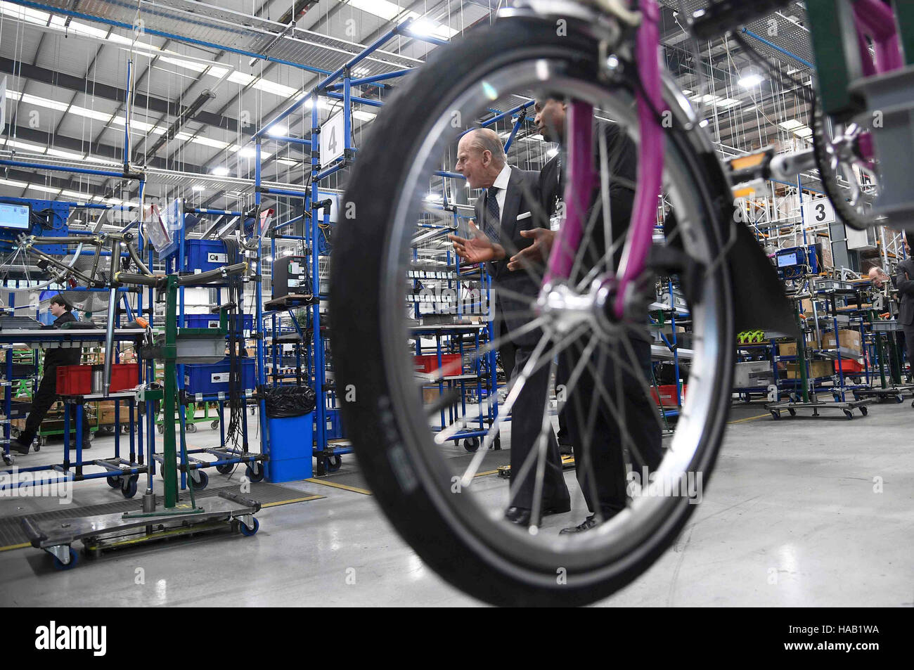 The Duke of Edinburgh (centre) is given a tour as he opens the new ...