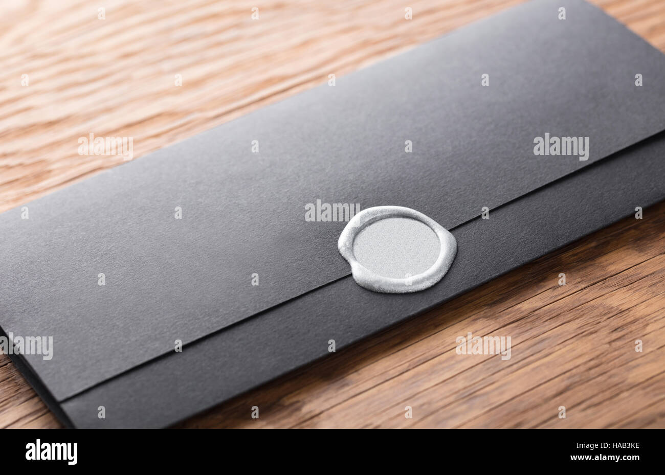 Envelope paper on wooden hi-res stock photography and images - Alamy