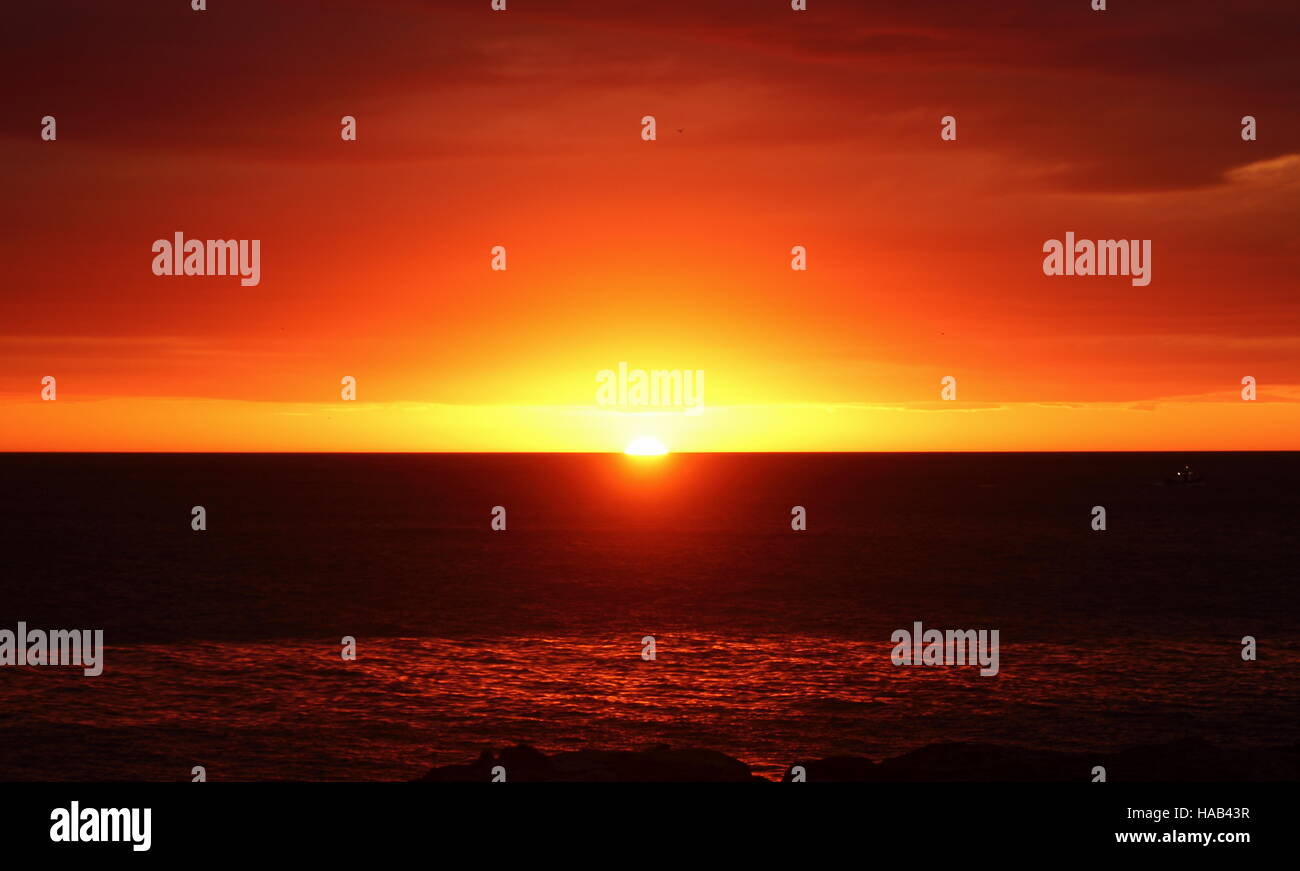 Deep orange sunrise Stock Photo - Alamy