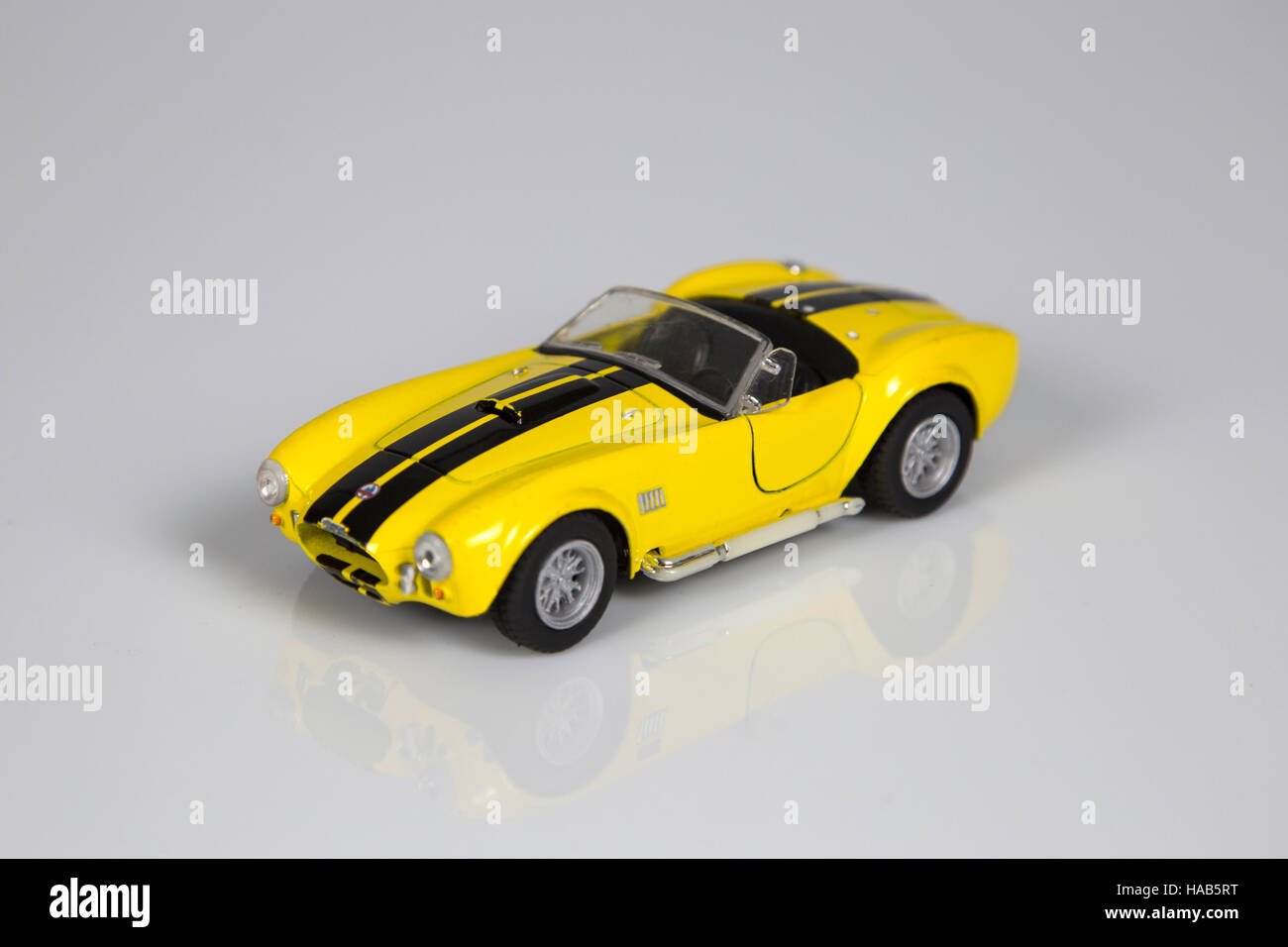 Toy yellow car fot children Stock Photo - Alamy