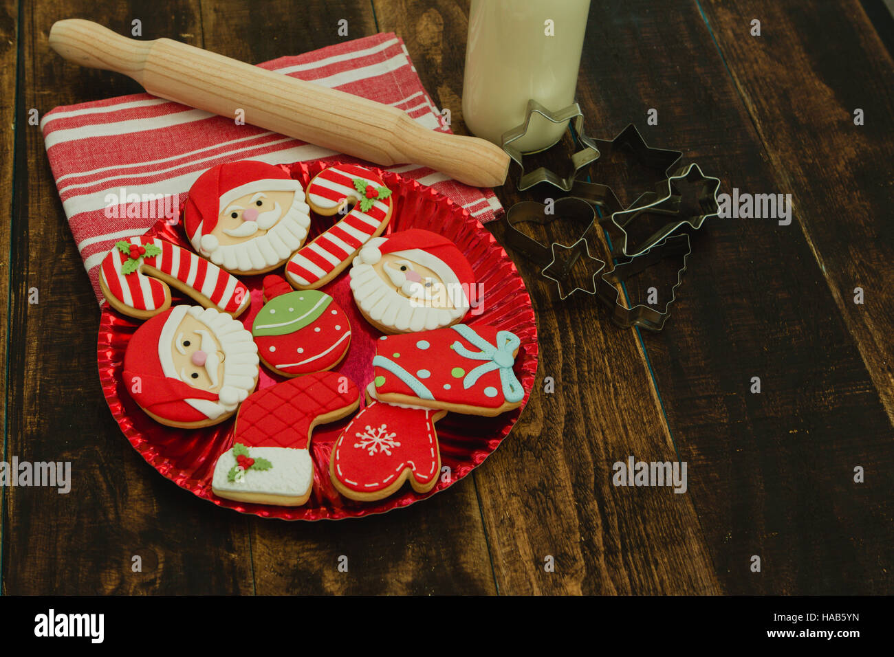 Beautiful cookies for Christmas in red on a wooden background Stock ...