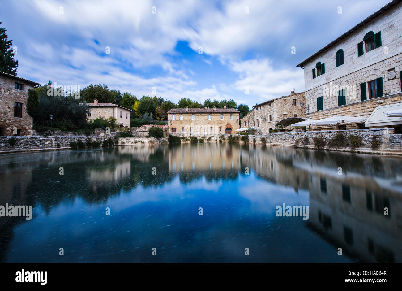 Ancient thermal baths in the medieval village of Bagno Vignoni in ...