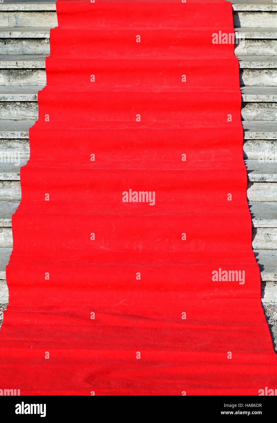 elegant long red carpet on the steps waiting for the arrival of vips ...
