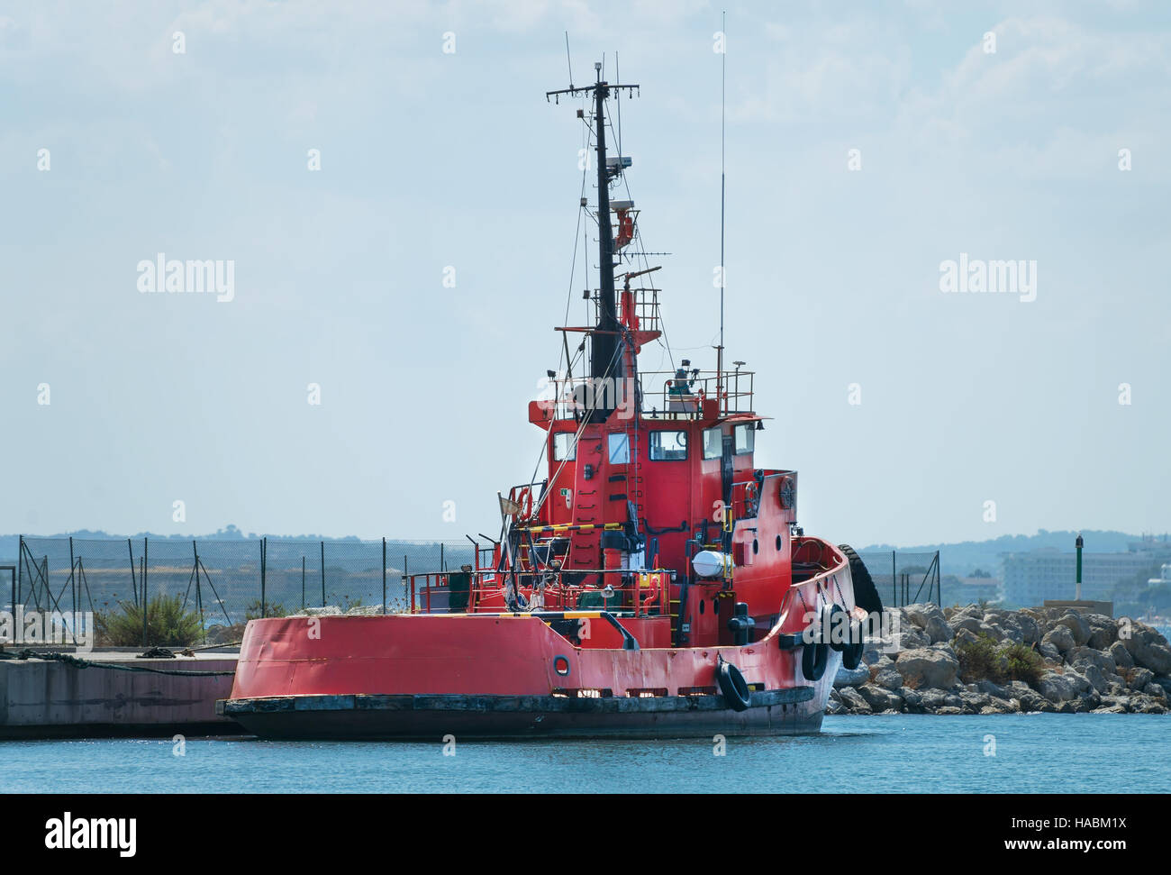 Red tugboat in the port Stock Photo - Alamy