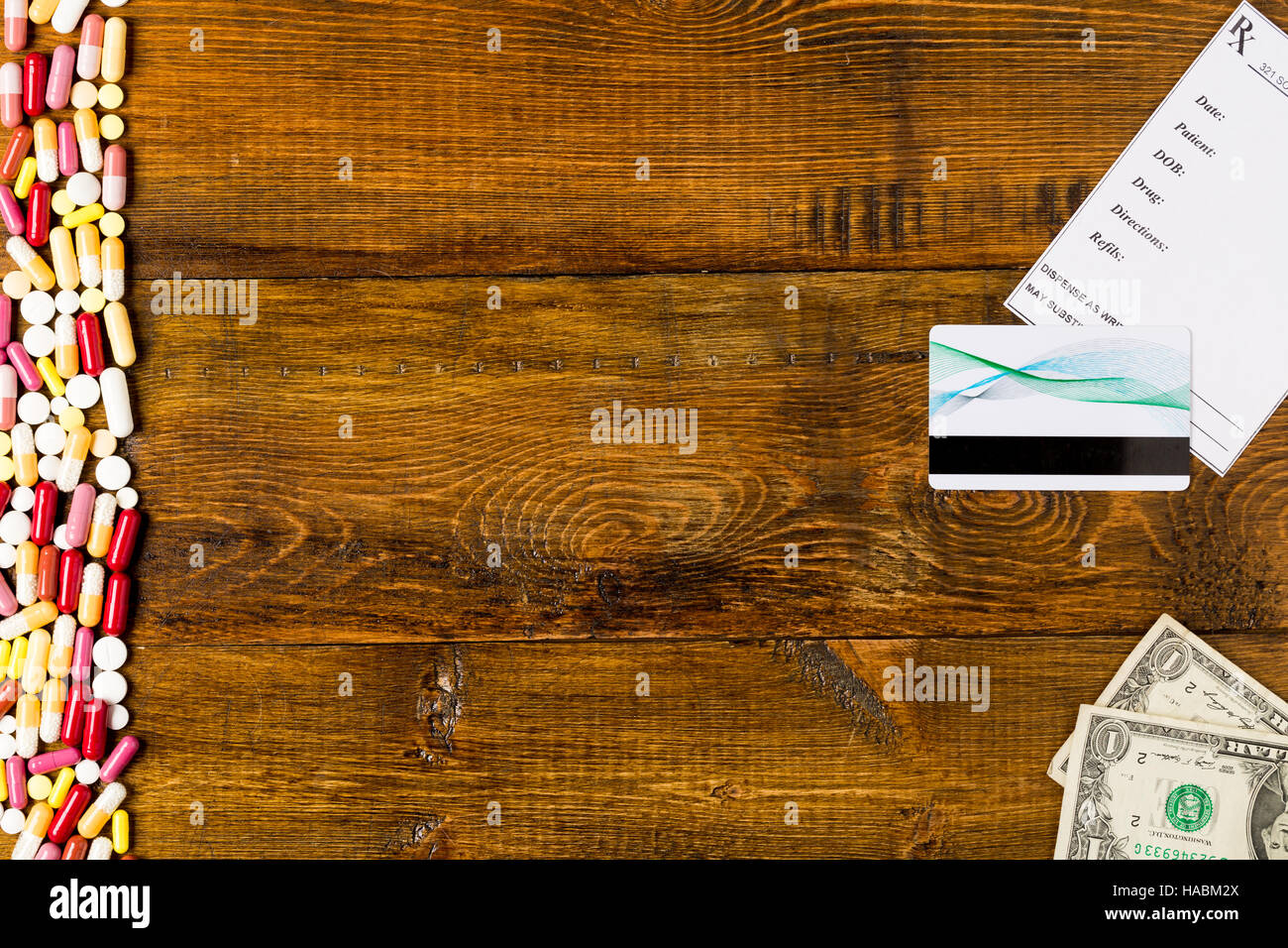 Border from various colorful pills. Blank prescription and bank card ...