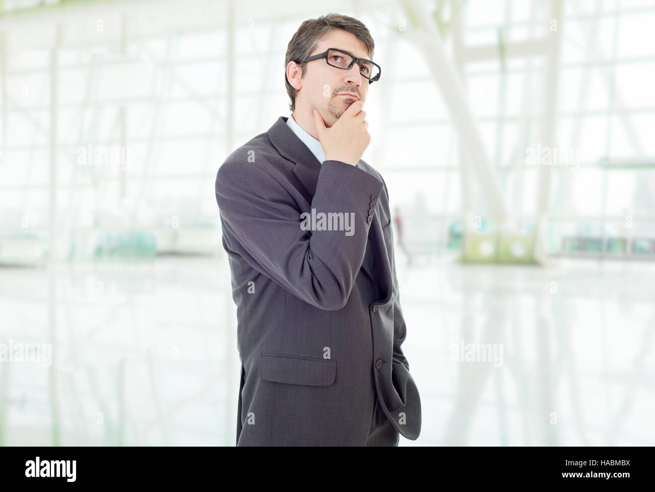 young business man thinking, at the office Stock Photo - Alamy