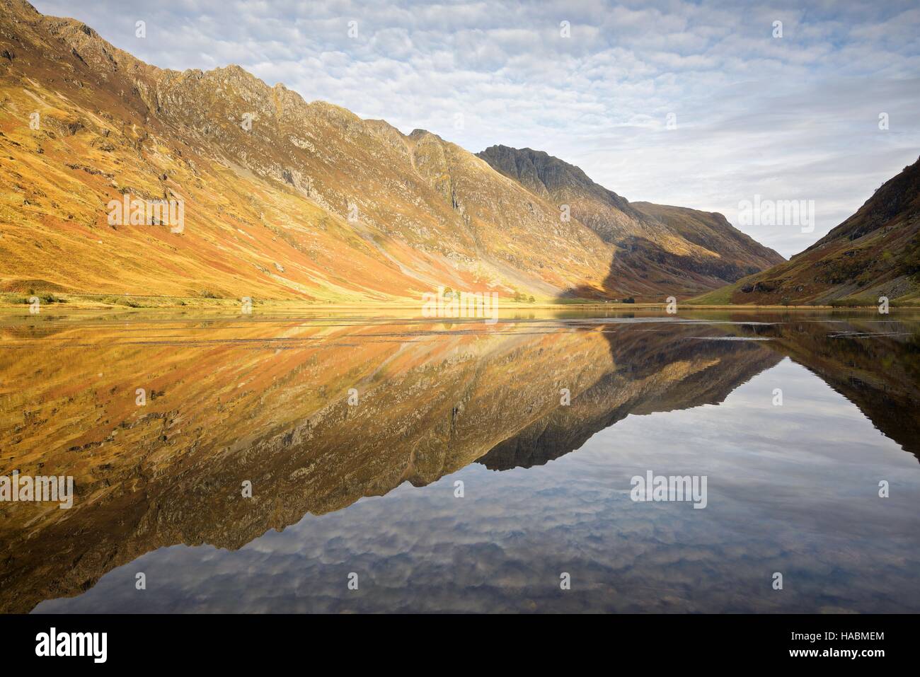 Colour reflections of Loch Achtrocitan in Glencoe Stock Photo - Alamy
