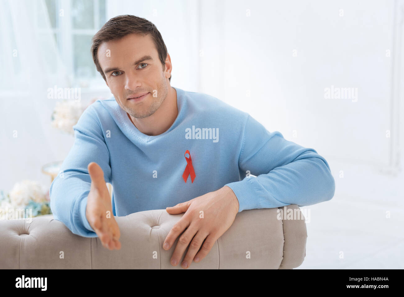 Handsome positive man looking at you Stock Photo - Alamy