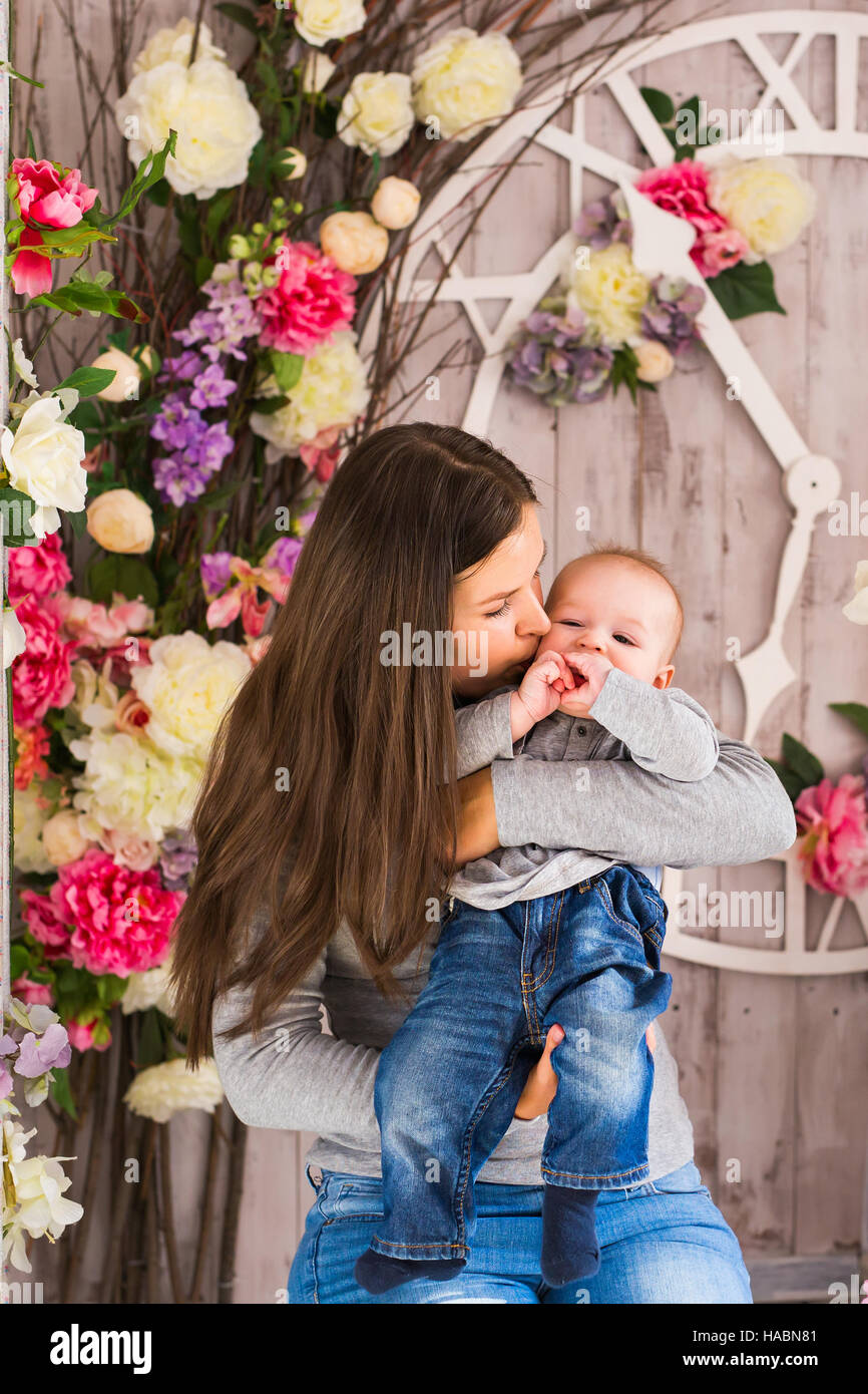 Mother holding sweet baby boy Stock Photo - Alamy