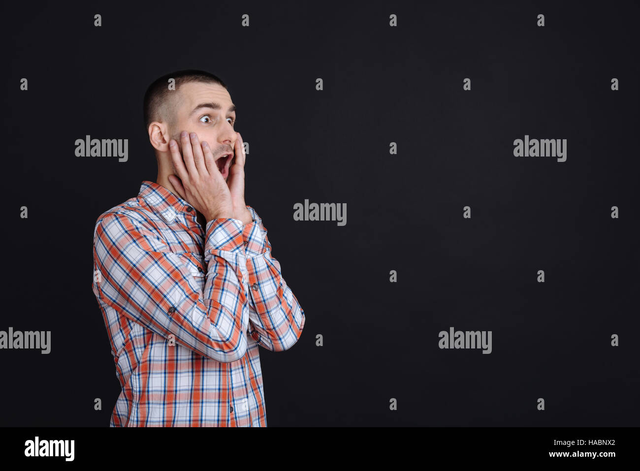 Portrait of man looking with confusion Stock Photo - Alamy
