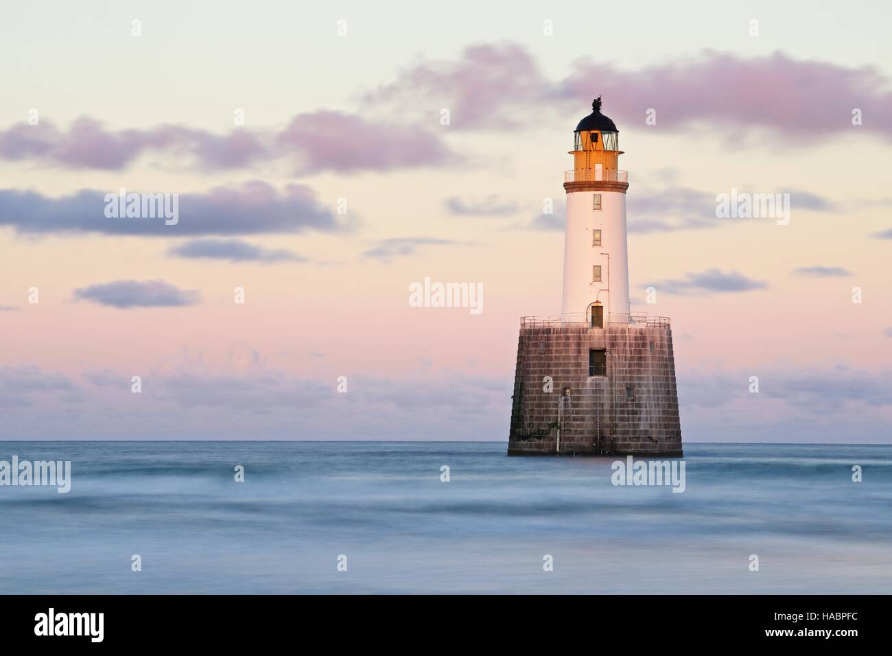 Sunset at the famous Rattray head Lighthouse Stock Photo - Alamy