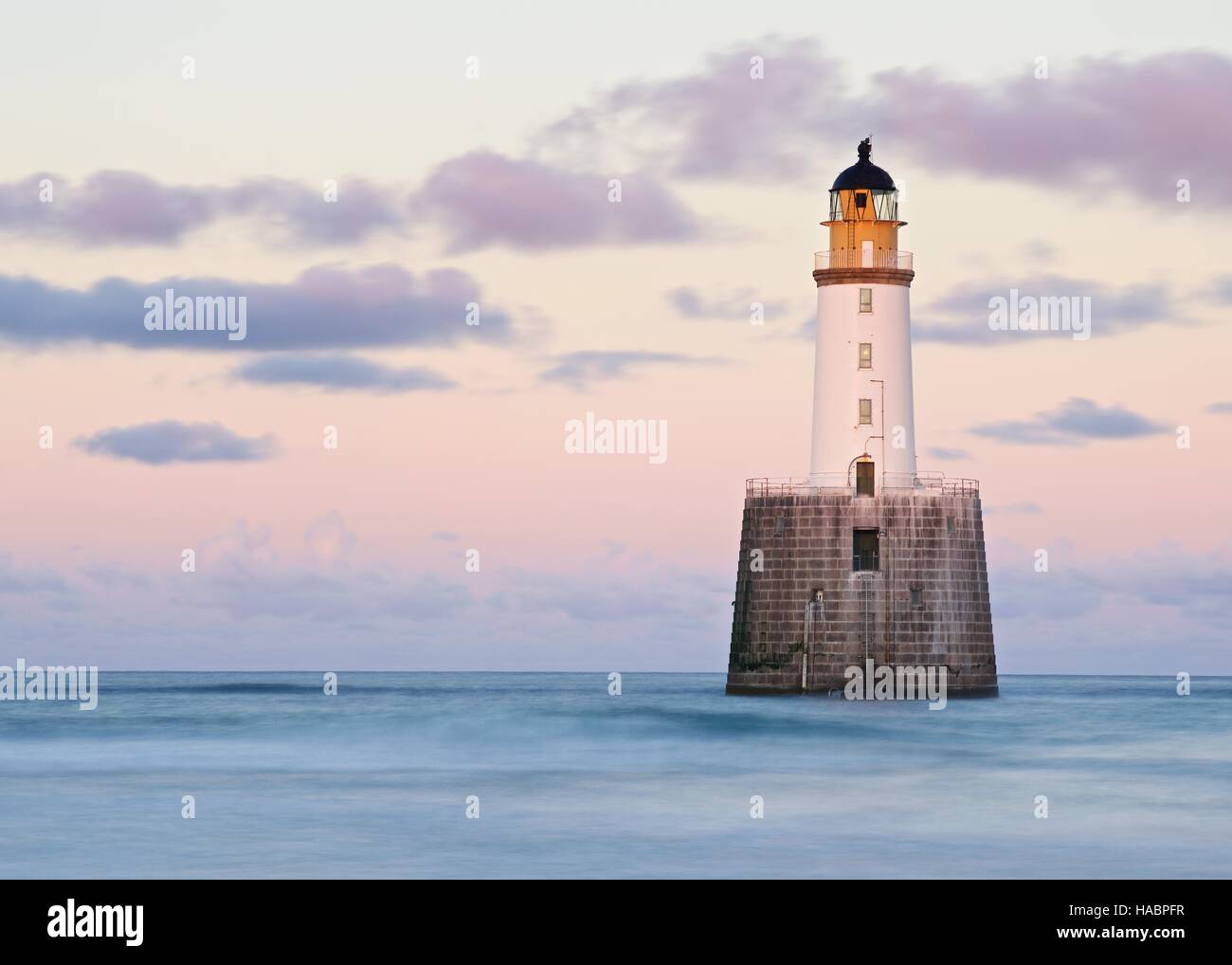Sunset at the famous Rattray head Lighthouse Stock Photo - Alamy