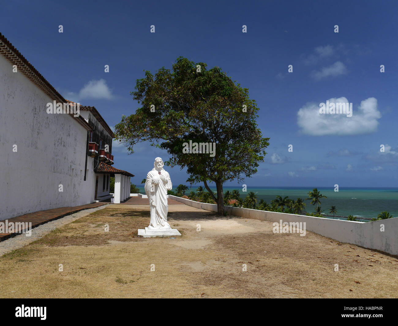 Religious statue outside Olinda cathedral with sea in background Stock ...