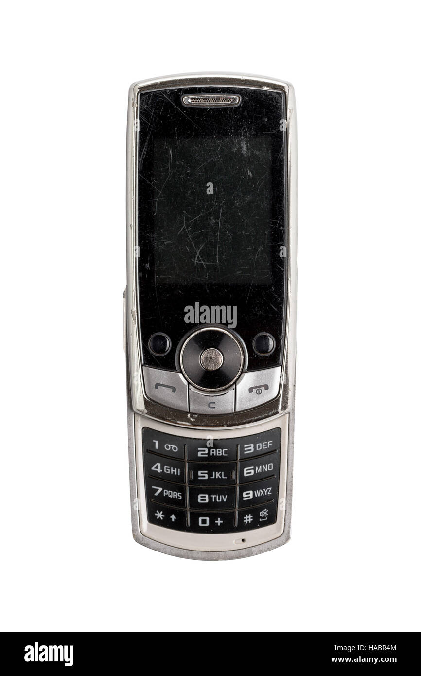very old scratched mobile phone, isolated on white Stock Photo - Alamy
