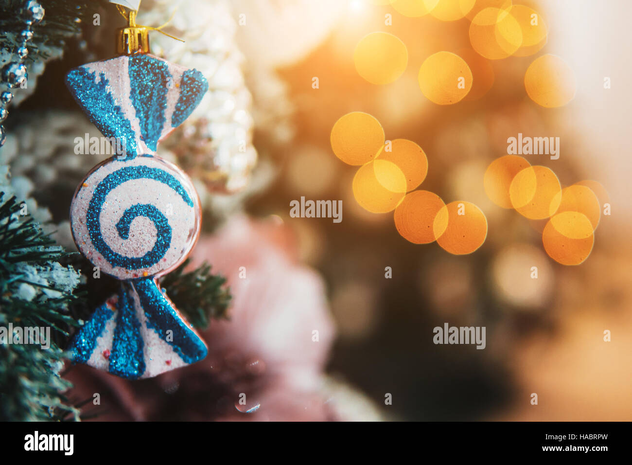 Christmas tree branch with toys Stock Photo - Alamy