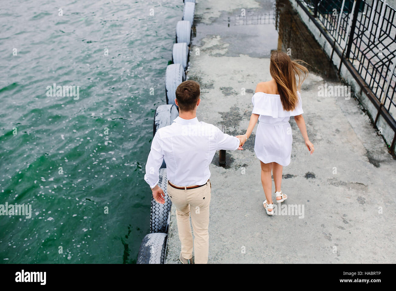 man and woman posing on the lake Stock Photo - Alamy