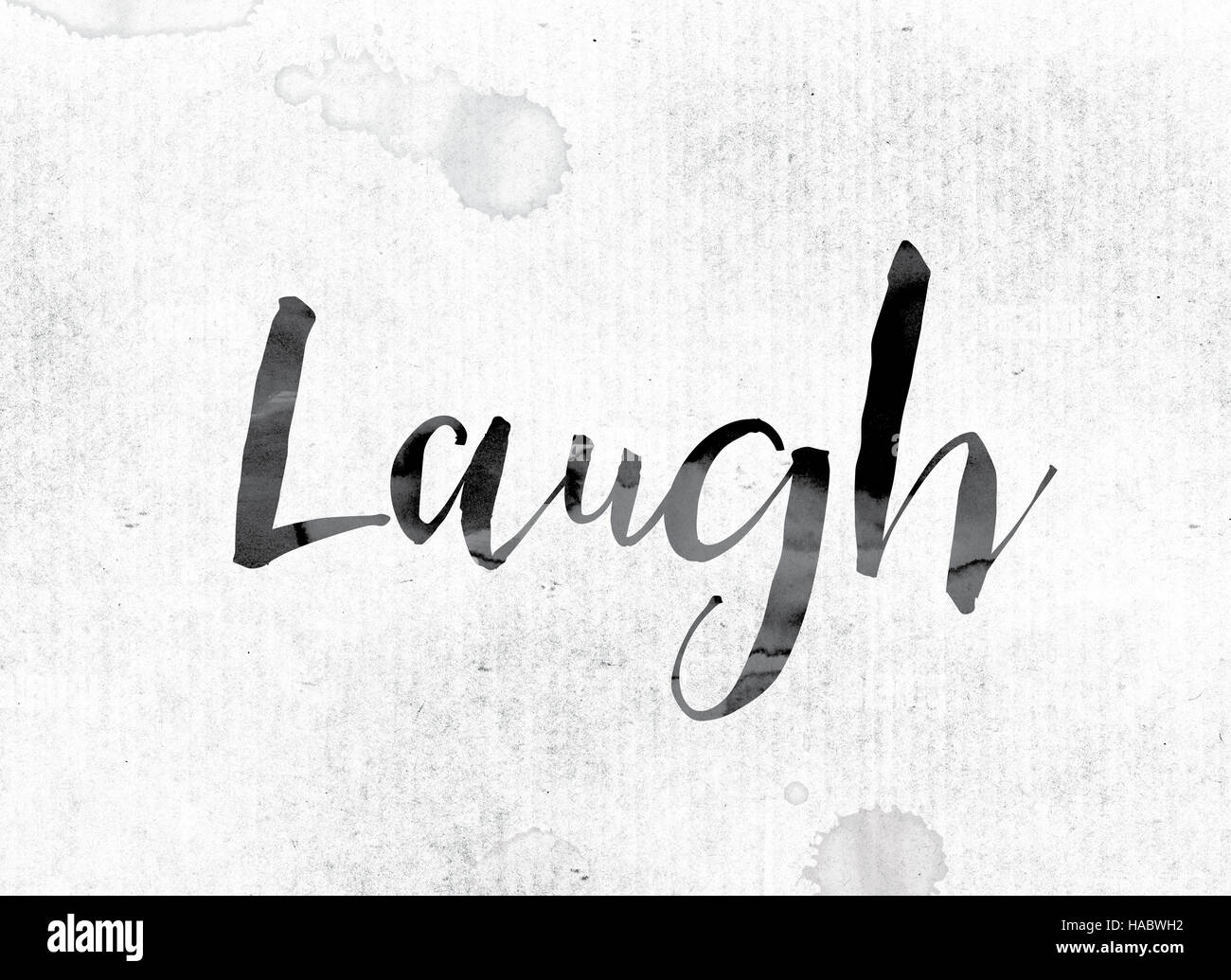 The word "Laugh" concept and theme painted in watercolor ink on a white ...