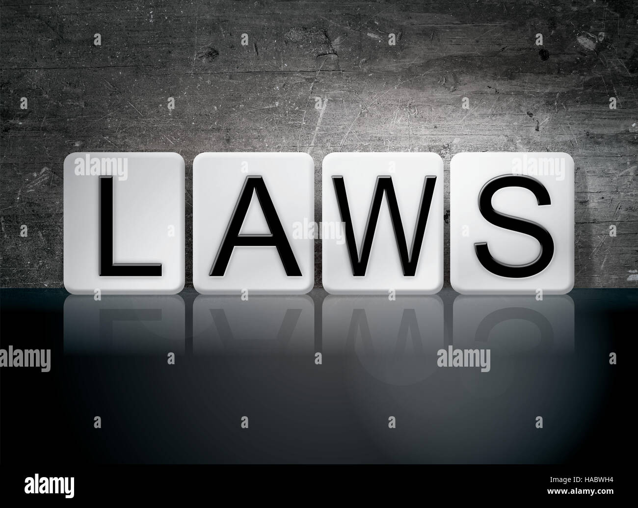 The word "Laws" written in white tiles against a dark vintage grunge ...