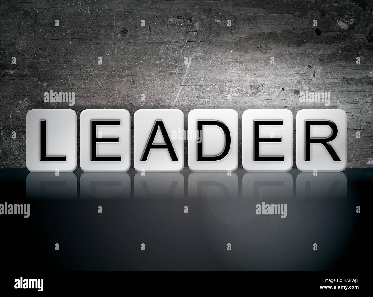 The word "Leader" written in white tiles against a dark vintage grunge ...