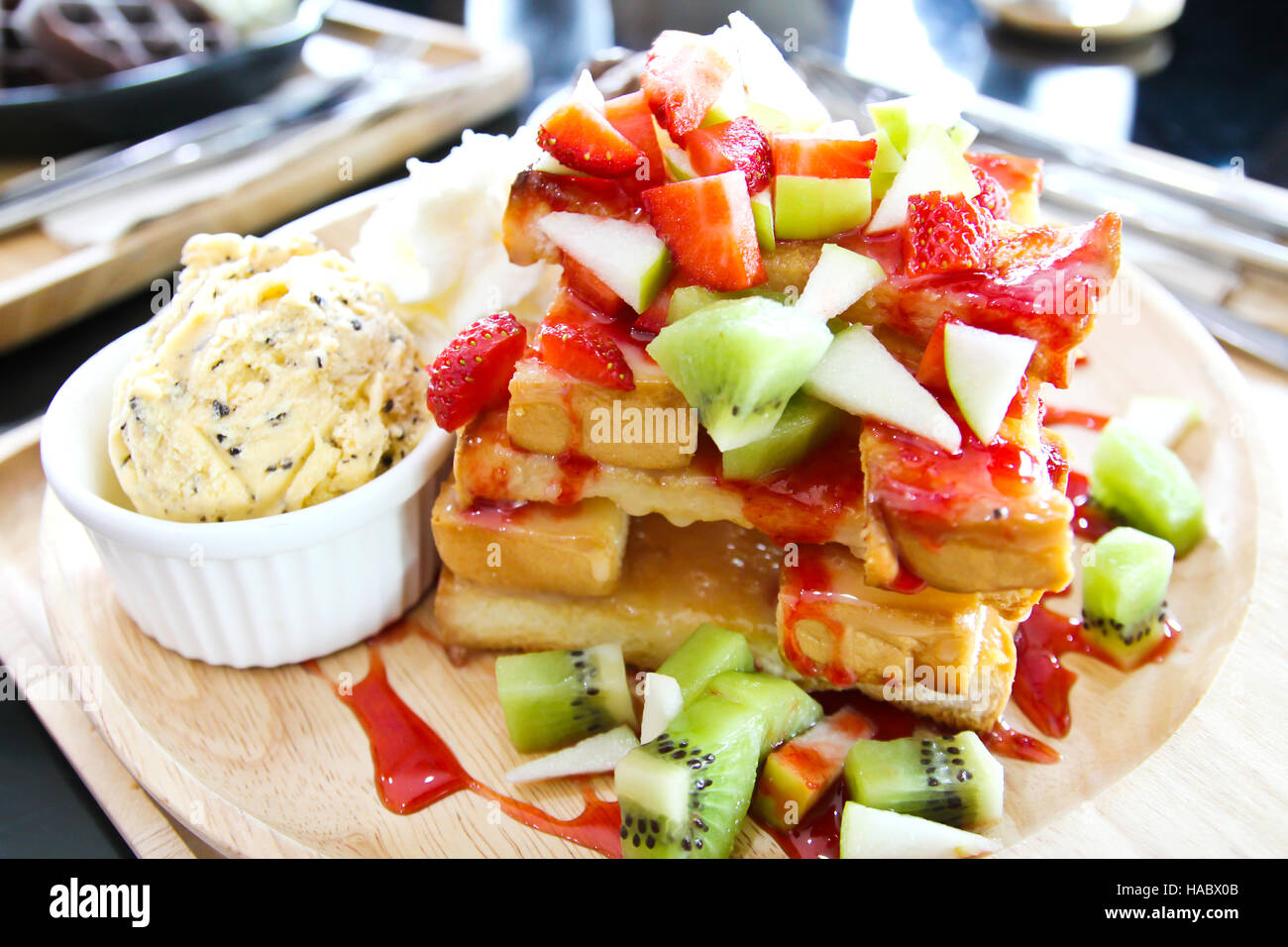 toasted bread with ice cream and fruits Stock Photo - Alamy