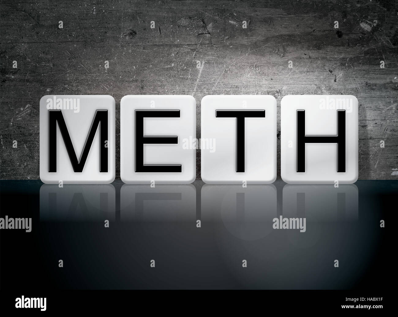 The word "Meth" written in white tiles against a dark vintage grunge ...