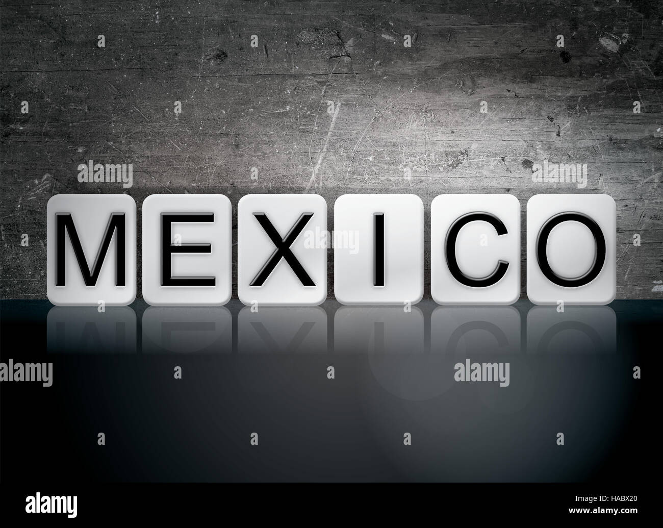 The word "Mexico" written in white tiles against a dark vintage grunge ...