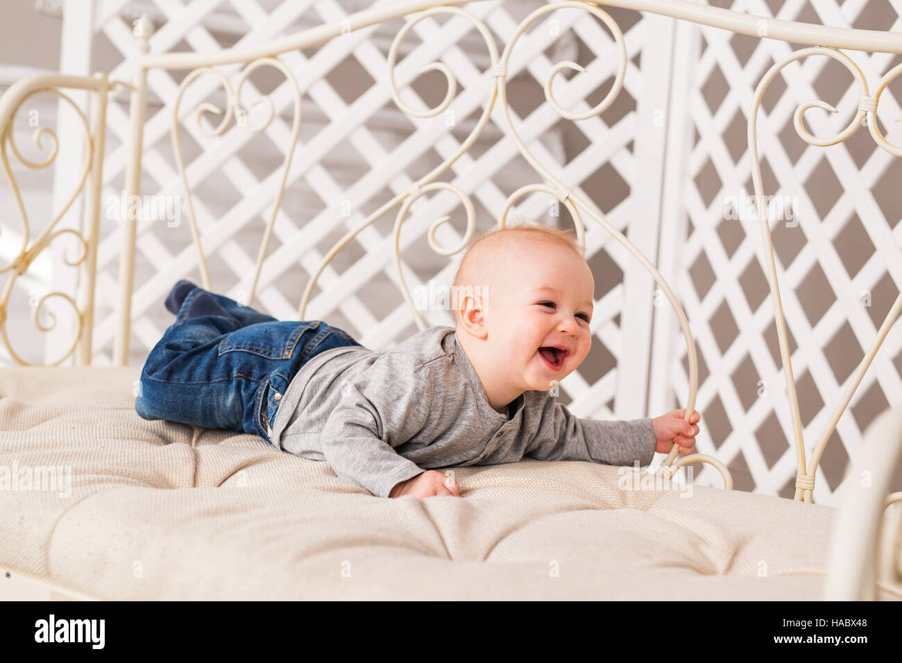 Cute baby boy laughing Stock Photo - Alamy