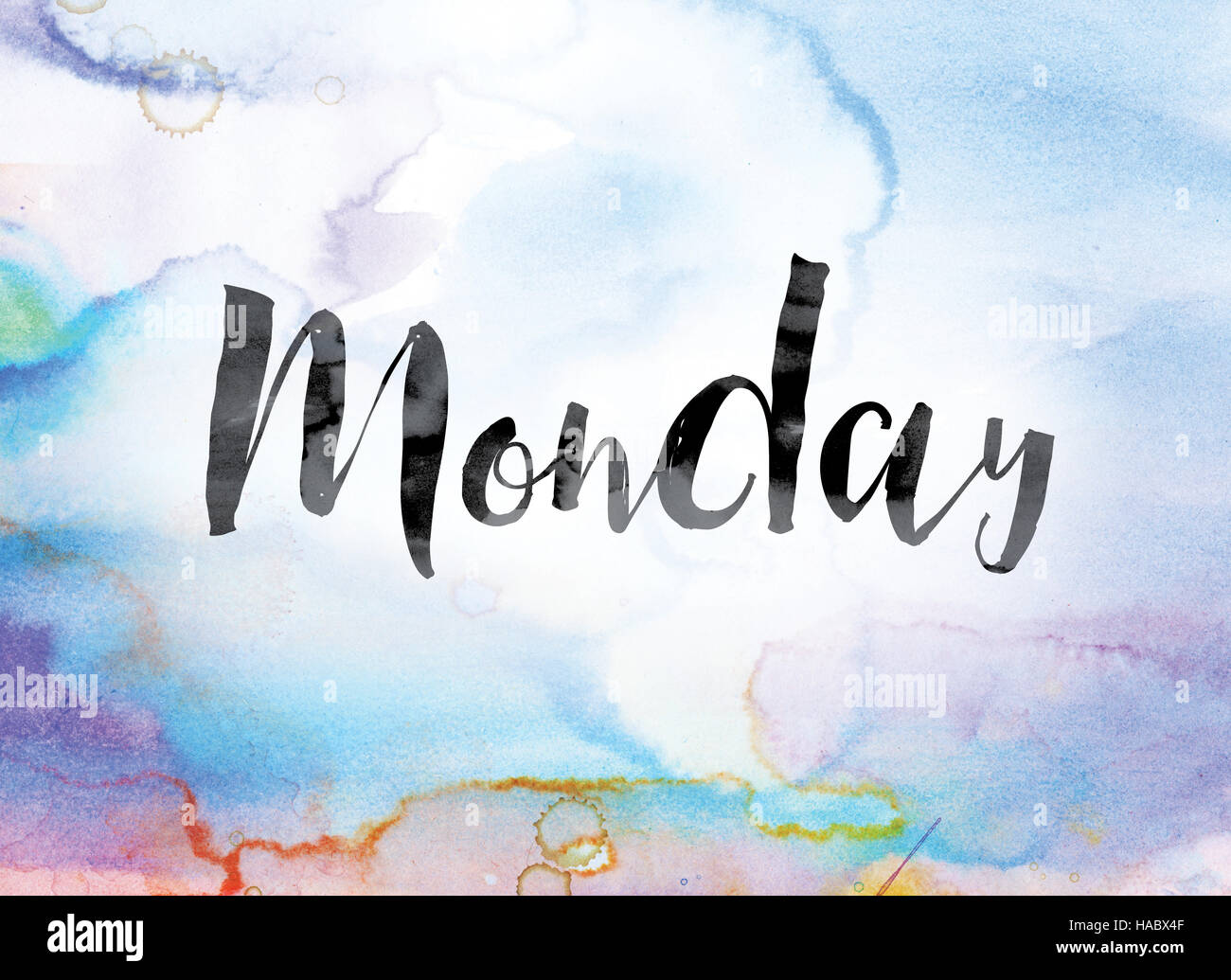 The word "Monday" painted in black ink over a colorful watercolor ...