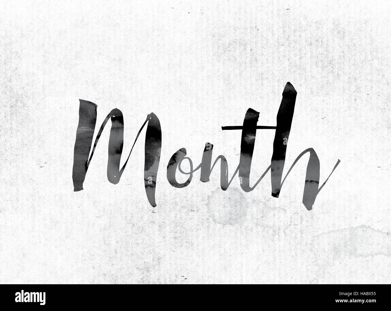 The word "Month" concept and theme painted in watercolor ink on a white ...