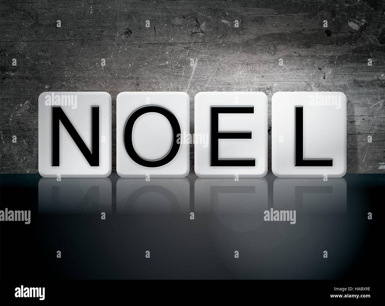 The word "Noel" written in white tiles against a dark vintage grunge ...