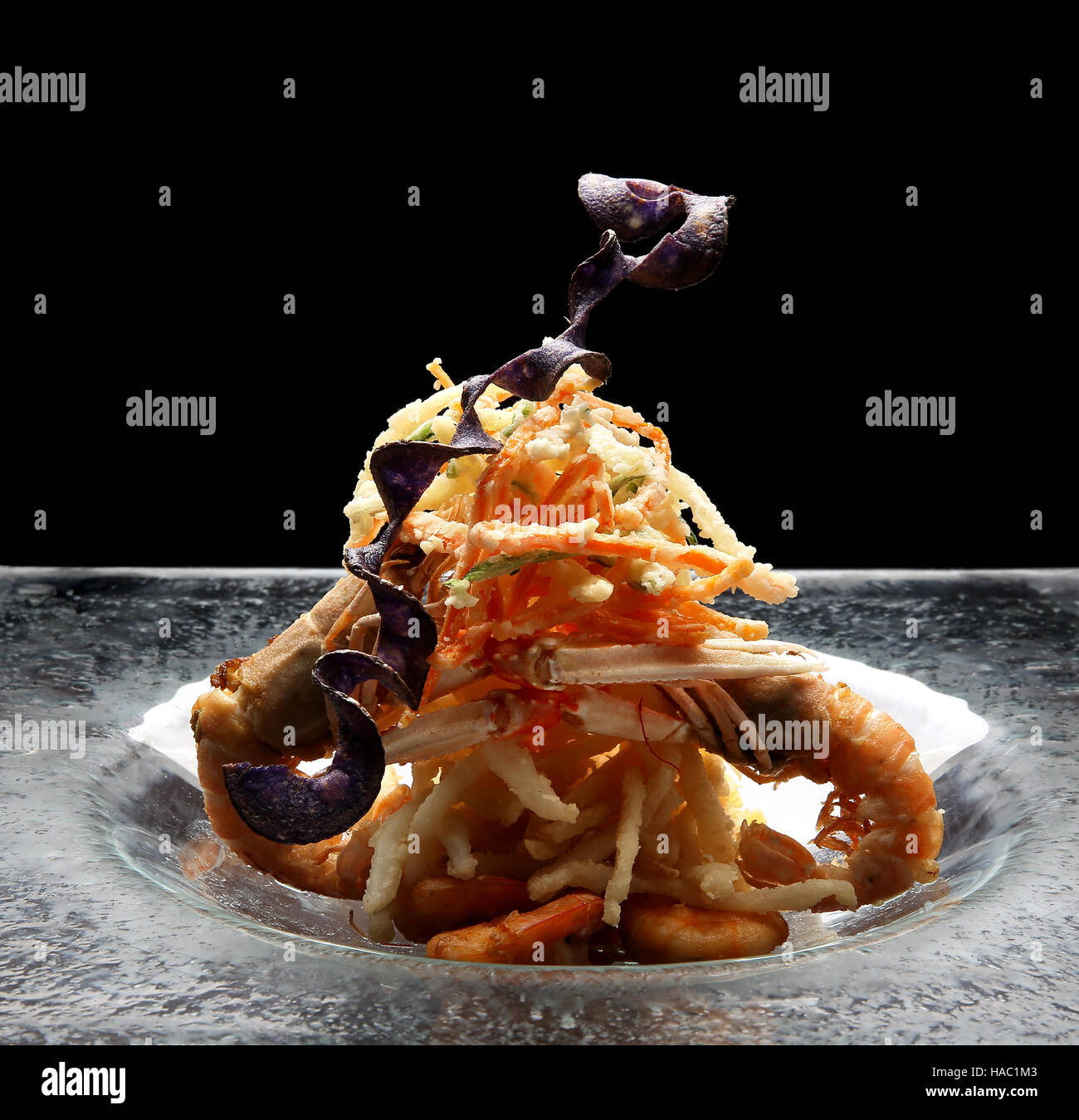 fish fry with black background Stock Photo - Alamy
