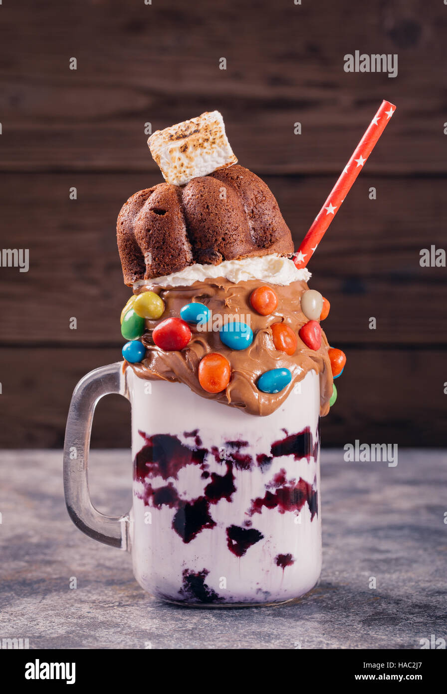 Jar of homemade extreme milkshake Stock Photo - Alamy