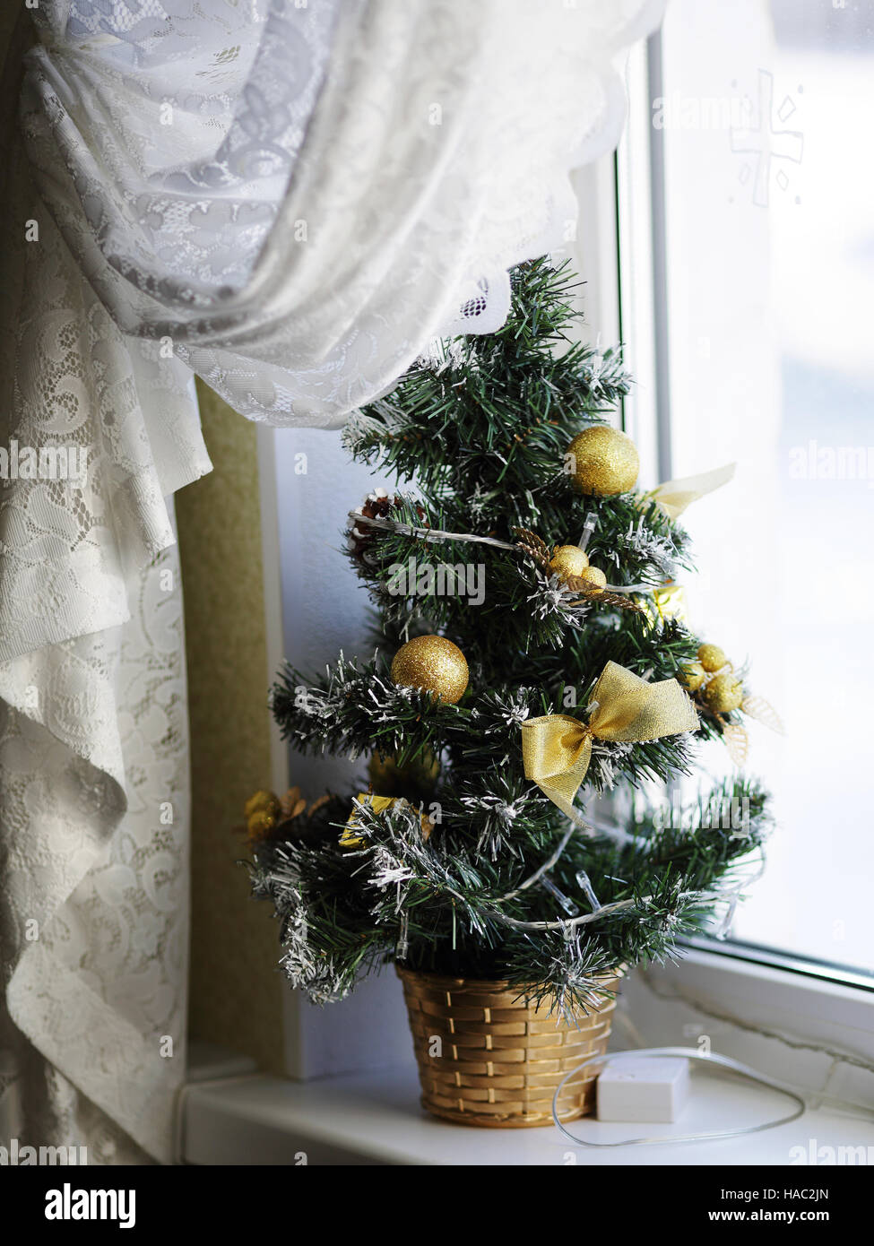 Christmas tree snow window hi-res stock photography and images - Alamy