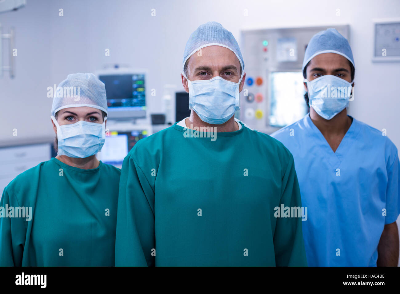 Portrait of surgeons standing in operation room Stock Photo - Alamy
