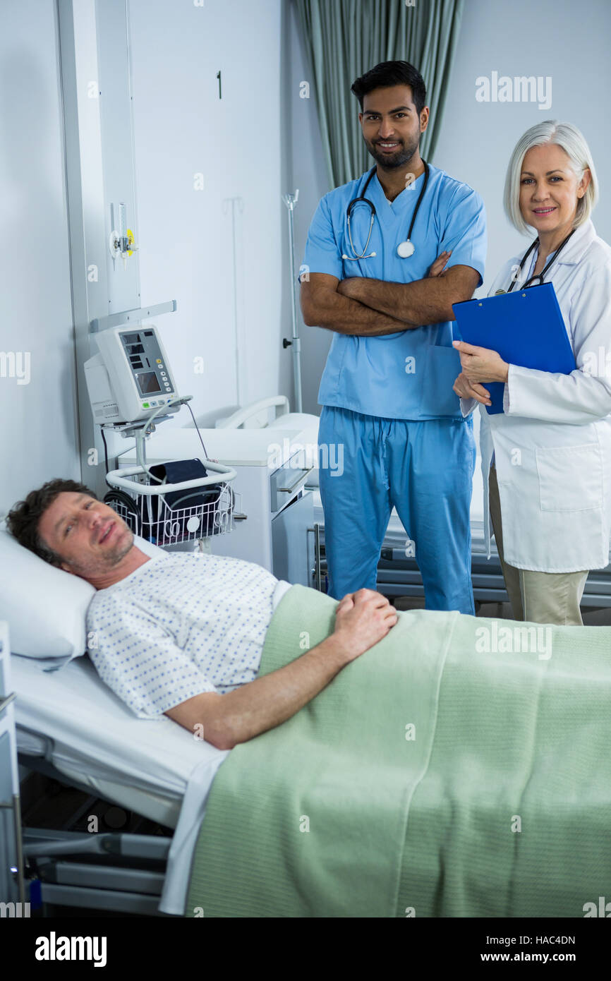 Portrait of doctor patient and smiling Stock Photo - Alamy