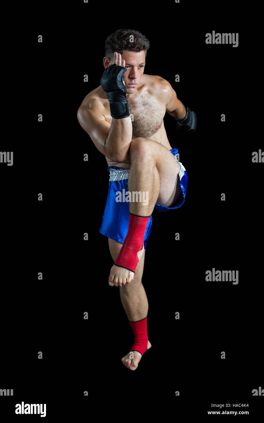 Boxer performing boxing stance Stock Photo - Alamy