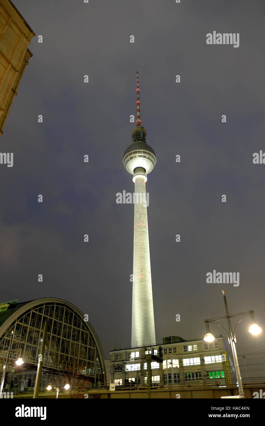Vertical view of TV Tower lit up at night Alexanderplatz East Berlin KATHY DEWITT Stock Photo ...