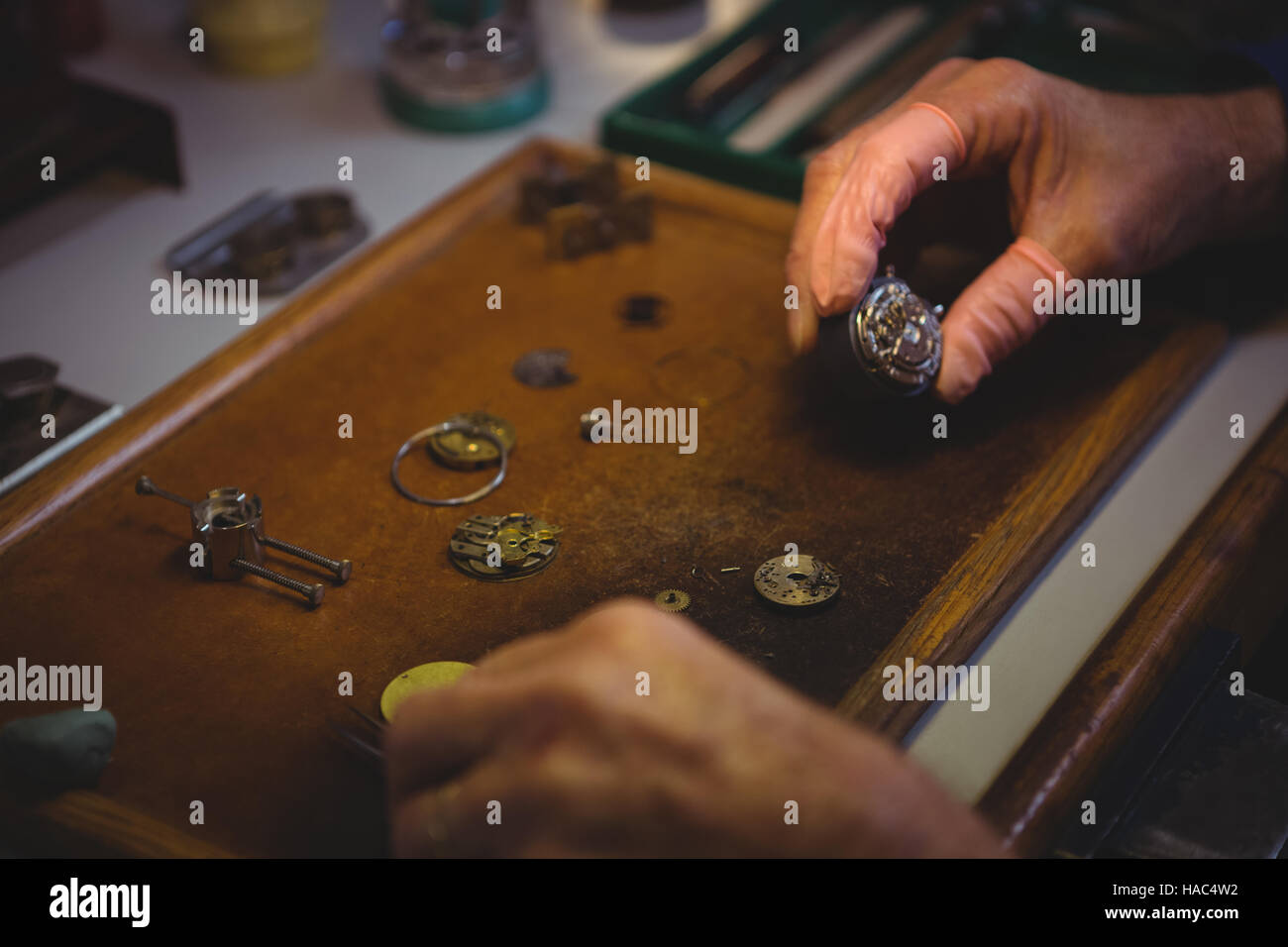 Horologist repairing a watch Stock Photo - Alamy