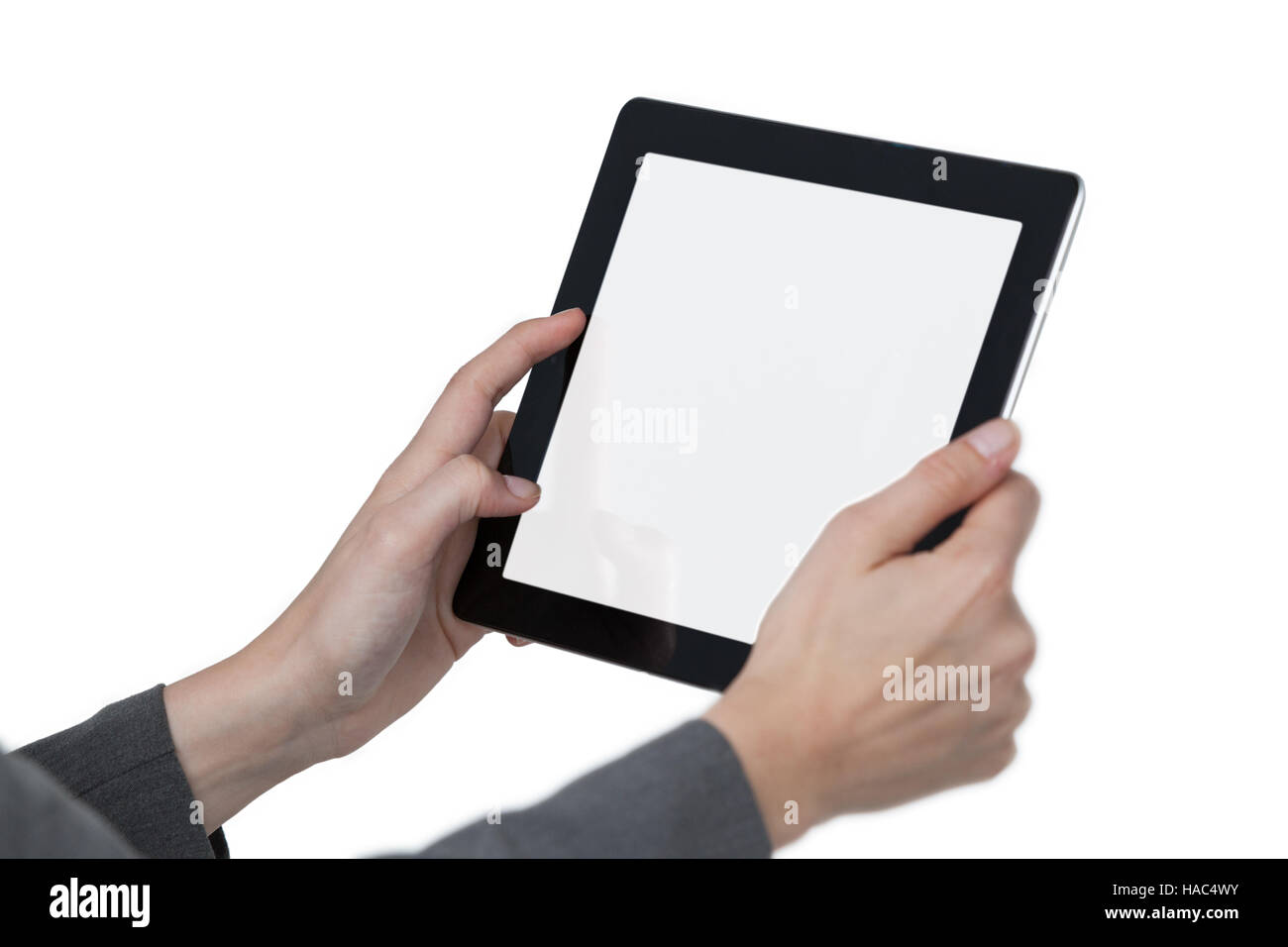 Businesswoman hand using digital tablet Stock Photo - Alamy