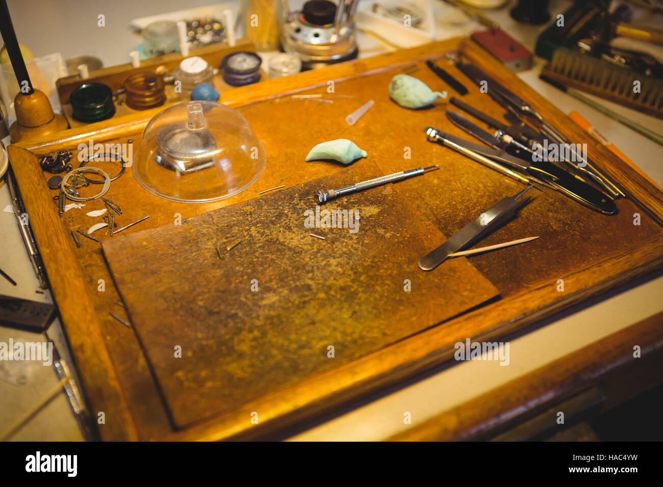 Horologists workshop with clock repairing tools Stock Photo - Alamy